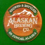 the sign carver creates custom carved wooden signs with gold leaf and ...
